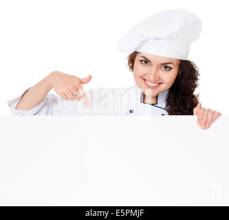 Pretty cook girl with a blank poster isolated on white background Stock ...