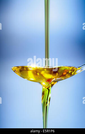 Vegetable oil onto spoon Stock Photo - Alamy