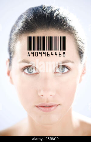 Woman with barcode on forehead Stock Photo - Alamy