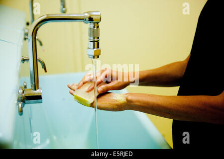Nurse washing her hands in the operating theater Stock Photo - Alamy