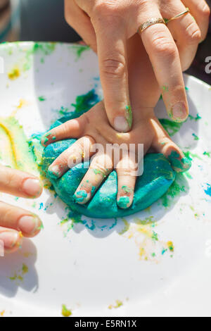 2 and a half year old girl with Down's syndrome with her mother Stock ...