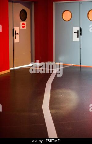 Hazard warning tape for the visually impaired to an elevator door Stock ...