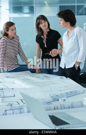Businesspeople and architects planning Stock Photo - Alamy