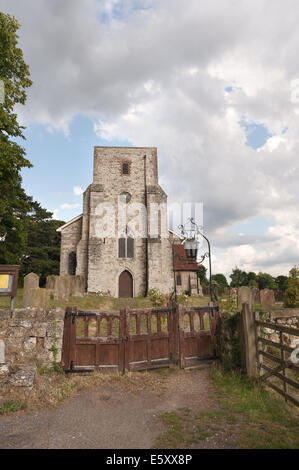 Chart Sutton Norman Church on a changeable weather day in mid summer a ...