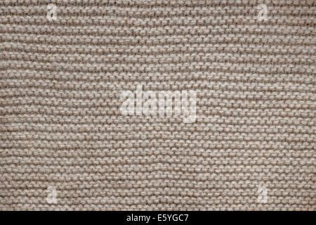 Knitted texture of brown knitted fabric with garter stitch pattern as ...