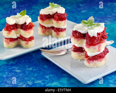 Homemade Heart shaped layered cake decorated with walnuts isolated on white Stock Photo - Alamy