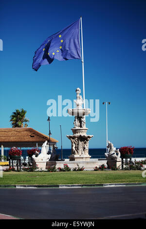 European Union flag over statue on roundabout in Estepona Spain Stock ...
