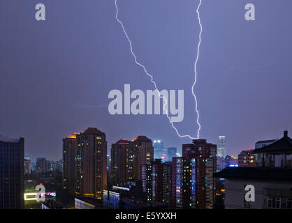 The sky is engulfed in lightning flashes and bolts criss-crossing the ...