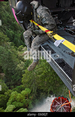 A California National Guard UH-60 Black Hawk helicopter prepares to ...