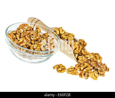 Handful of walnuts in scoop and glass bowl isolated on white Stock ...