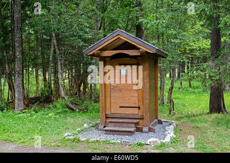 An outdoor toilet in the woods in Homer, Alaska USA Stock Photo: 955003 ...