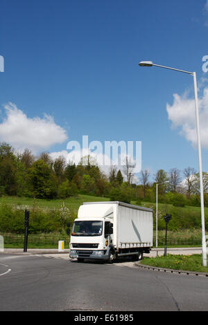 Front & side view white DAF hgv lorry truck & driver in tractor unit ...