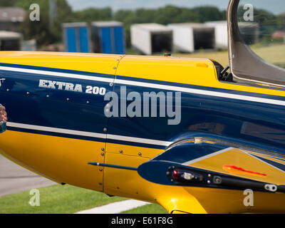 An Extra 200 aerobatic stunt aircraft at Breighton airfield, Yorkshire ...