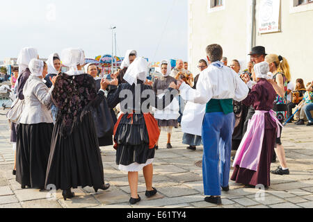 Breton dancing in traditional costumes at Oyster Festival at Arradon ...