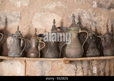 Antique traditional Arabic coffee pots on a market in Riyadh, Saudi ...