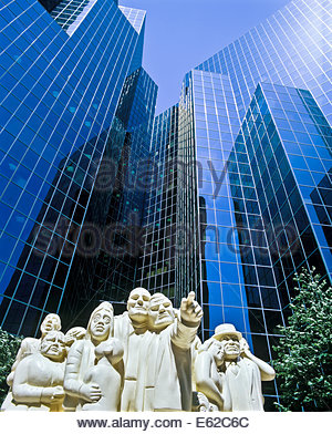 Illuminated Crowd Sculpture by Raymond Masson in front of a Stock Photo ...
