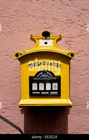 Yellow mailbox of Deutsche Post, German postal service, daily ...