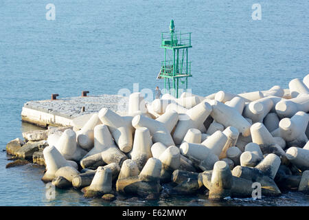 Dolosse type concrete blocks sea defences protect green channel marker ...