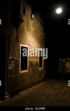 A crumbling old wall in Venice. Showing exposed bricks and neglected ...