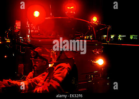 1990s FIREFIGHTERS AND EMT WORKING ON PATIENT Stock Photo - Alamy