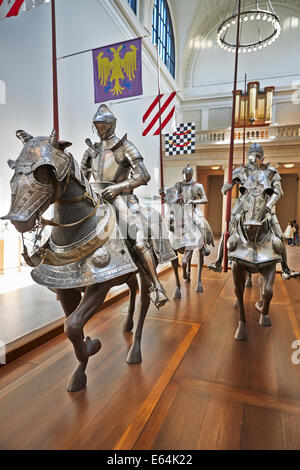 Medieval armor display in the Metropolitan museum. New York, USA Stock ...