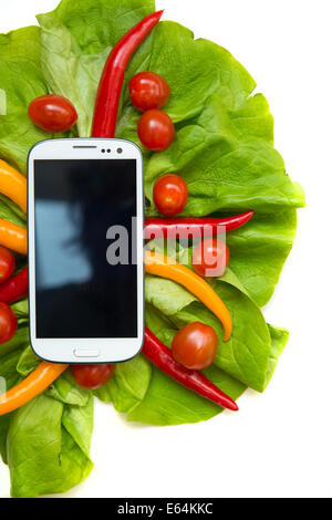Various vegetables with a Smartphone Stock Photo - Alamy
