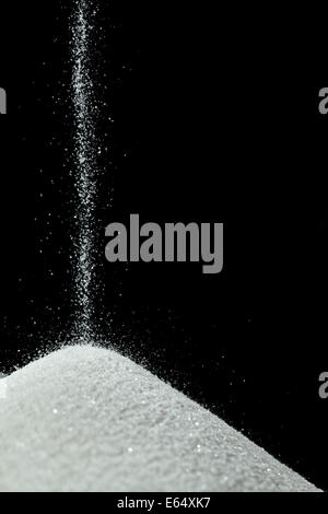 Sand grains falling Stock Photo - Alamy
