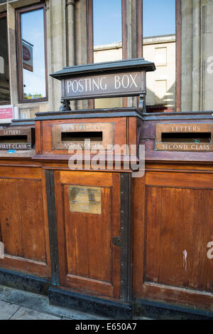 Old fashioned wooden posting box outside the main Post Office in Oxford ...