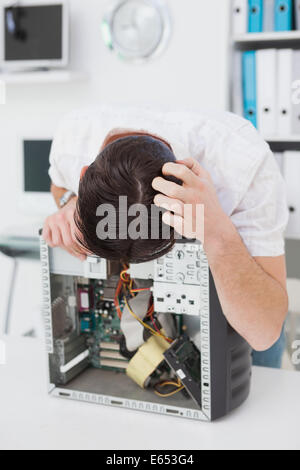 a computer engineer with motherboard diagnostics Stock Photo - Alamy