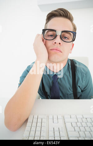 Portrait of man looking bored and uninterested, standing unamused ...