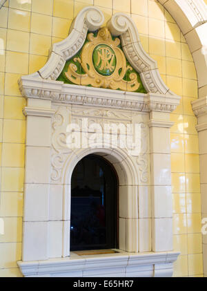 A closeup of window details of an old railroad station building in ...