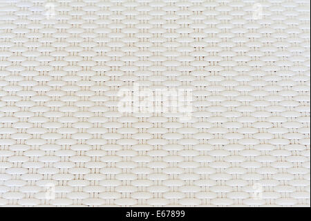 White cream plastic surface with repeating pattern. For use as ...
