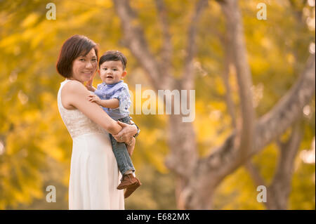 A young kids in a park walk Stock Photo - Alamy