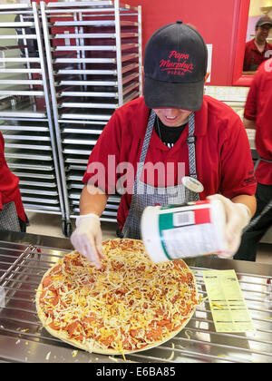 Female Employee Prepares a Pizza, Small Business, pizzeria, USA Stock ...