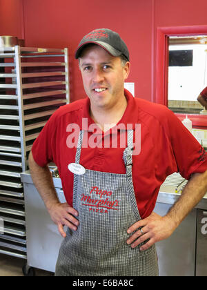 Small Business Owner of Pizza Shop with Tray of Lasagna, USA Stock ...