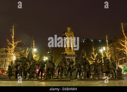 The Rembrandt statue at night on Rembrandtplein (Rembrandt Square) is ...