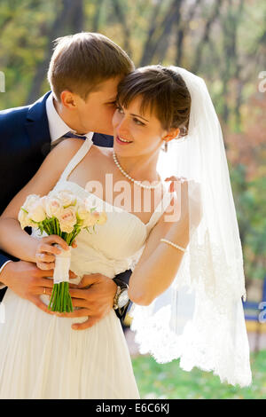 Portrait of a beautiful bride in veil, gray background Stock Photo - Alamy