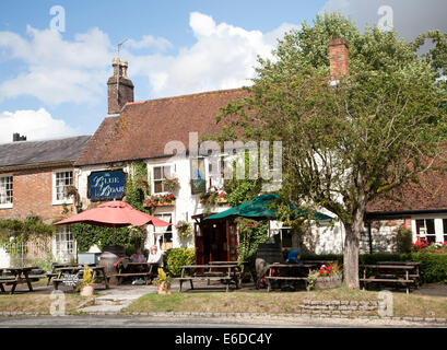 The Blue Boar pub on the village green in Aldbourne, Wiltshire, England ...