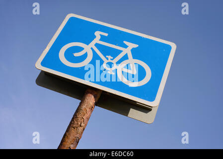 blue signs showing the bike route of Sustrans National Cycle network ...
