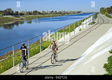 Bicycle path along Ballona Creek with the snow covered San Gabriel ...