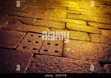 wet old granite pavement closeup Stock Photo - Alamy