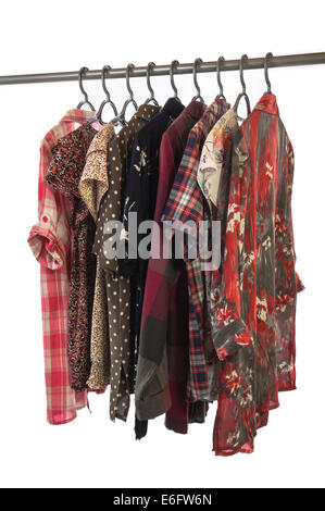 Selection of colorful hanging tops as a background Stock Photo - Alamy