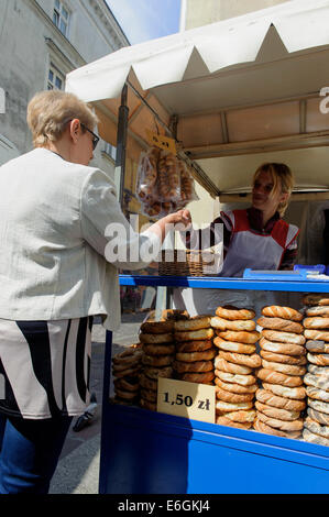 Bagel vendor in Krakow, Poland, Europe Stock Photo - Alamy