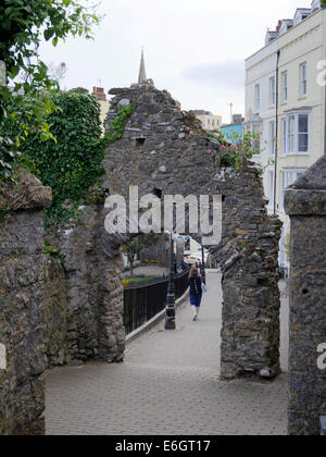 Ancient town walls in Tenby shelter the more modern Imperial hotel ...