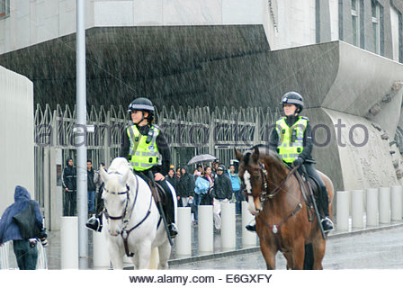 Police Scotland mounted officers on patrol during the 2014 Edinburgh ...