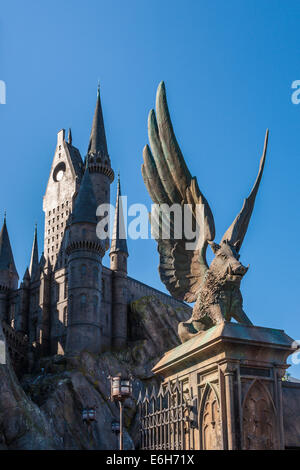 Winged hog statues and Hogwarts castle spires at The Wizarding World of ...