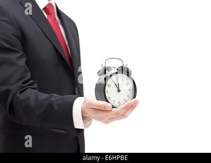 Businessman with clock isolated on white Stock Photo - Alamy