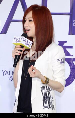 Taipei. 21st Aug, 2014. Singer Cindy Wang attends a commercial event ...