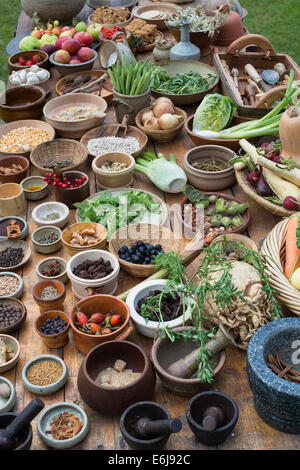 Table of medieval food including nuts seeds berries vegetables and ...