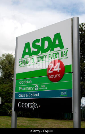 Asda store opening hours sign Stock Photo - Alamy